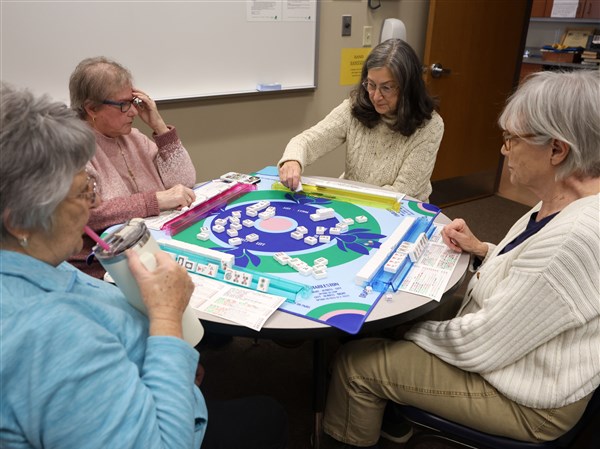 Miles of tiles: Local mahjong games matches seniors with new friends ...