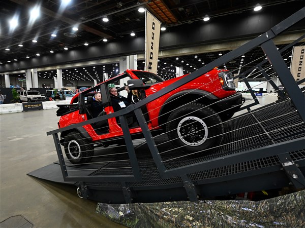 Detroit Auto Show opens as industry pares back splashy debuts and leans ...